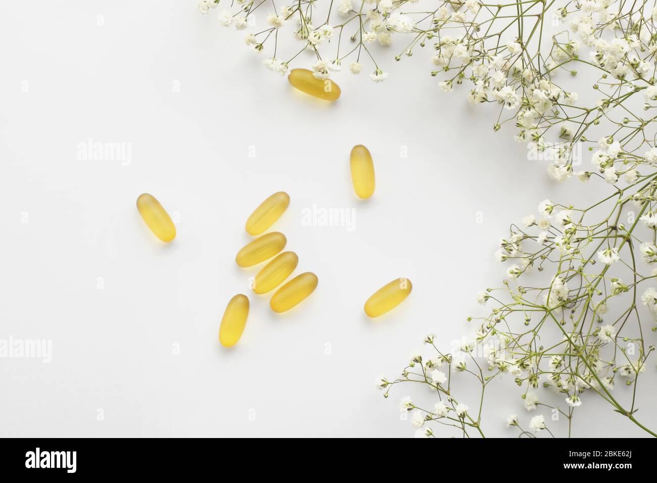 Cod liver oil omega 3 gel capsules isolated on white background. Fish ...