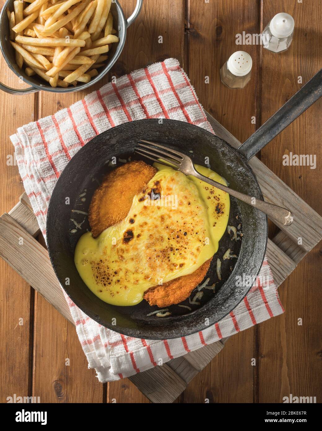 Parmo. Breaded chicken with béchamel sauce and melted cheese. North ...