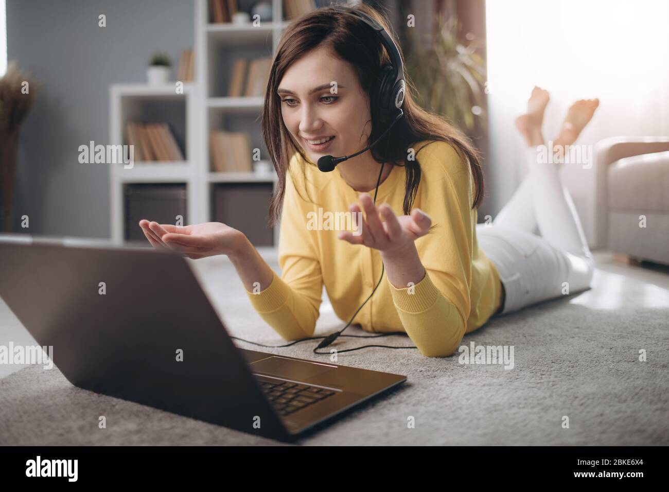 Beautiful woman having video conversation hi-res stock photography and ...