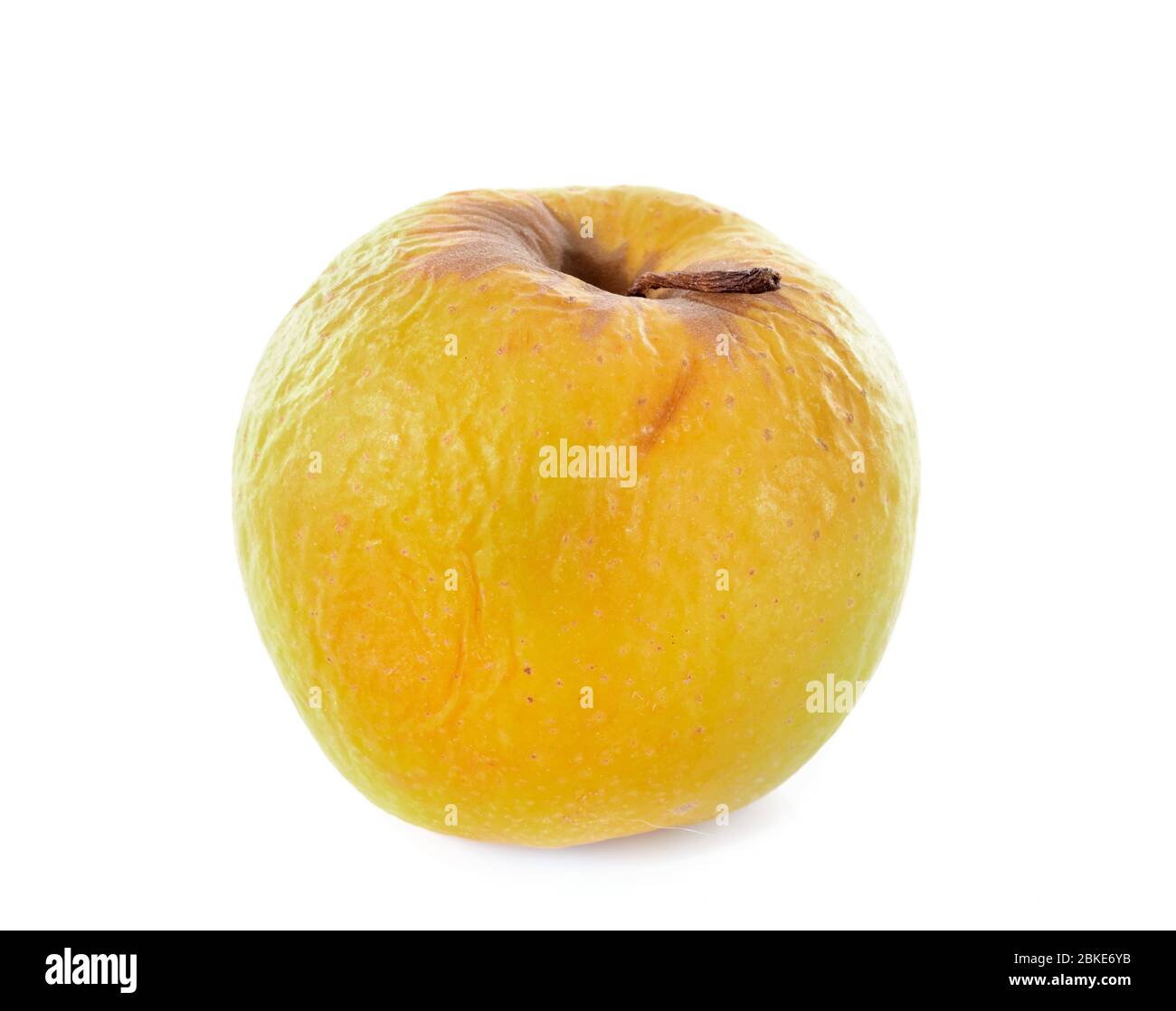 whitered Golden Delicious in front of white background Stock Photo - Alamy