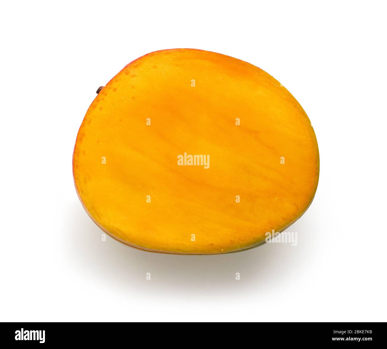 half of mango fruit isolated on white background, top view Stock Photo ...