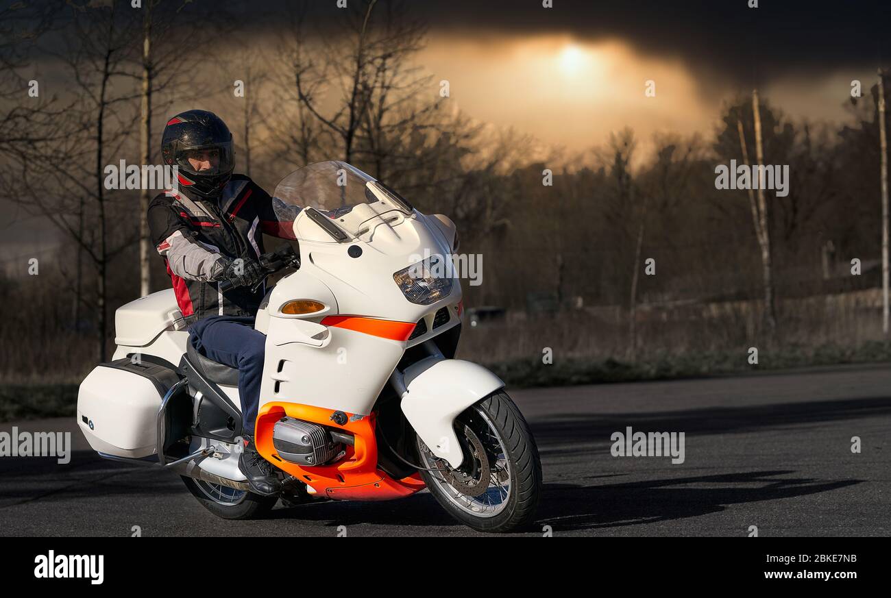 23-04-2020 Riga, Latvia. young man riding big bike motorcycle leaning ...