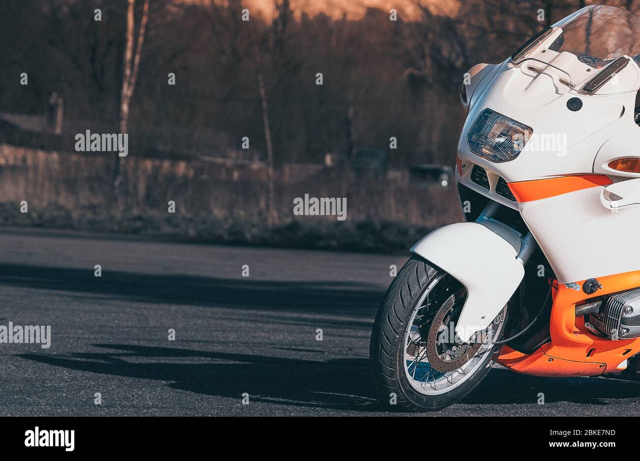 young man riding big bike motorcycle leaning curve on asphalt highways ...