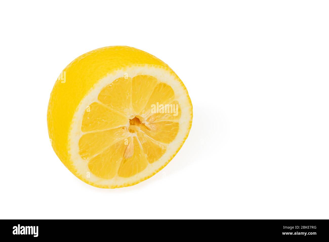 half yellow lemon with seeds isolated on white background Stock Photo ...