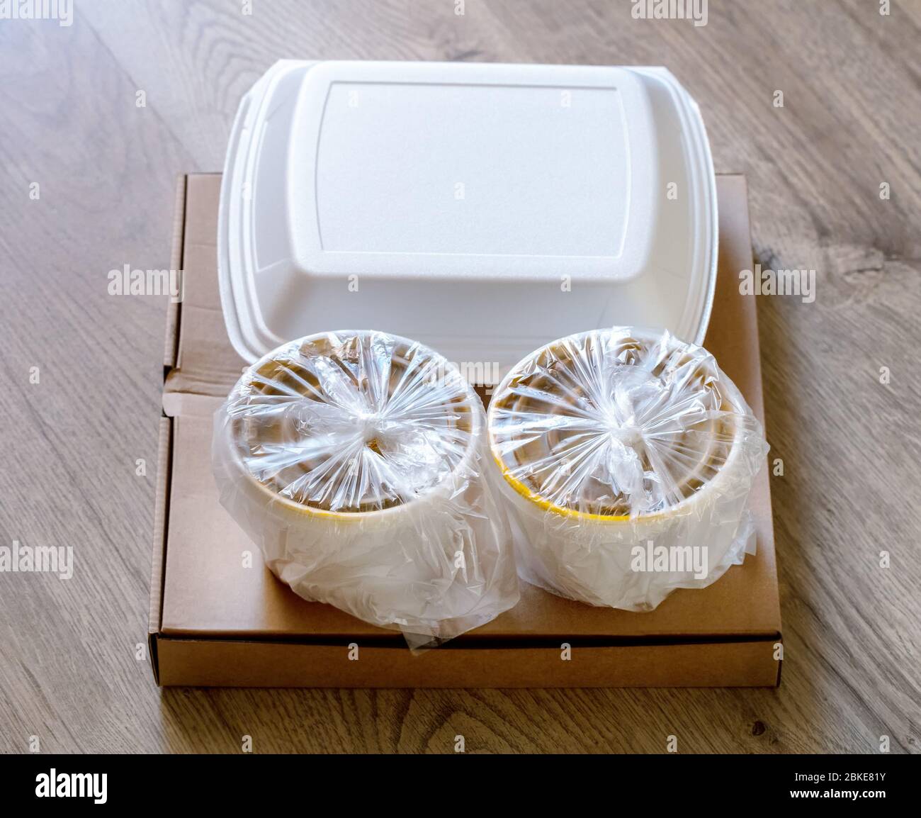 Food delivery service. Various containers of food at home Stock Photo ...
