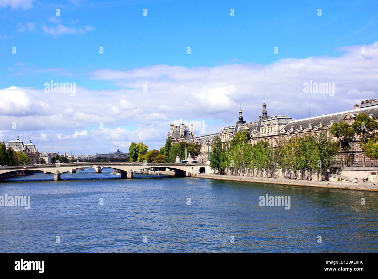 View of the Louvre palace and bridges across the Seine River, Paris ...