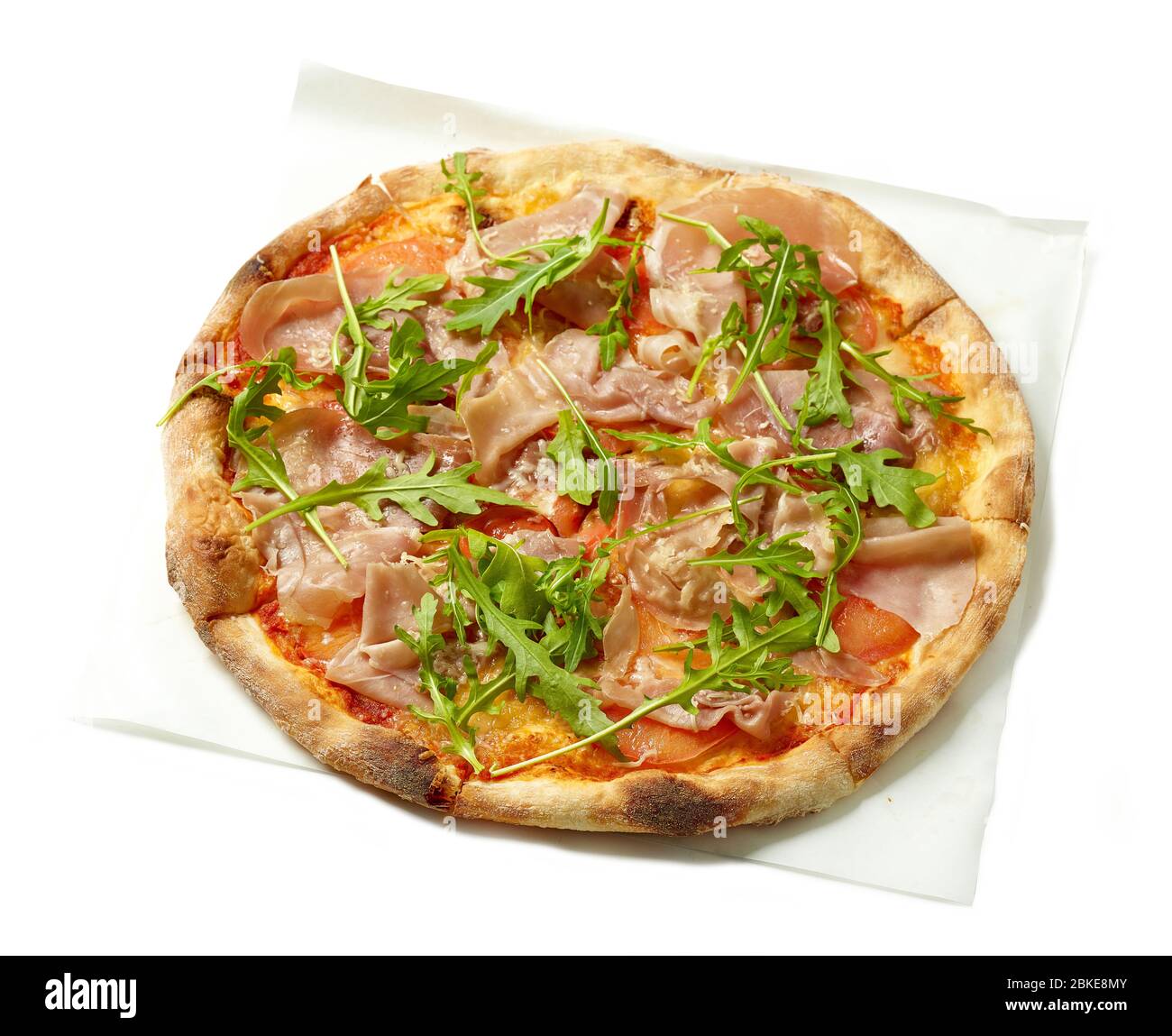 freshly baked pizza on paper sheet isolated on white background Stock ...