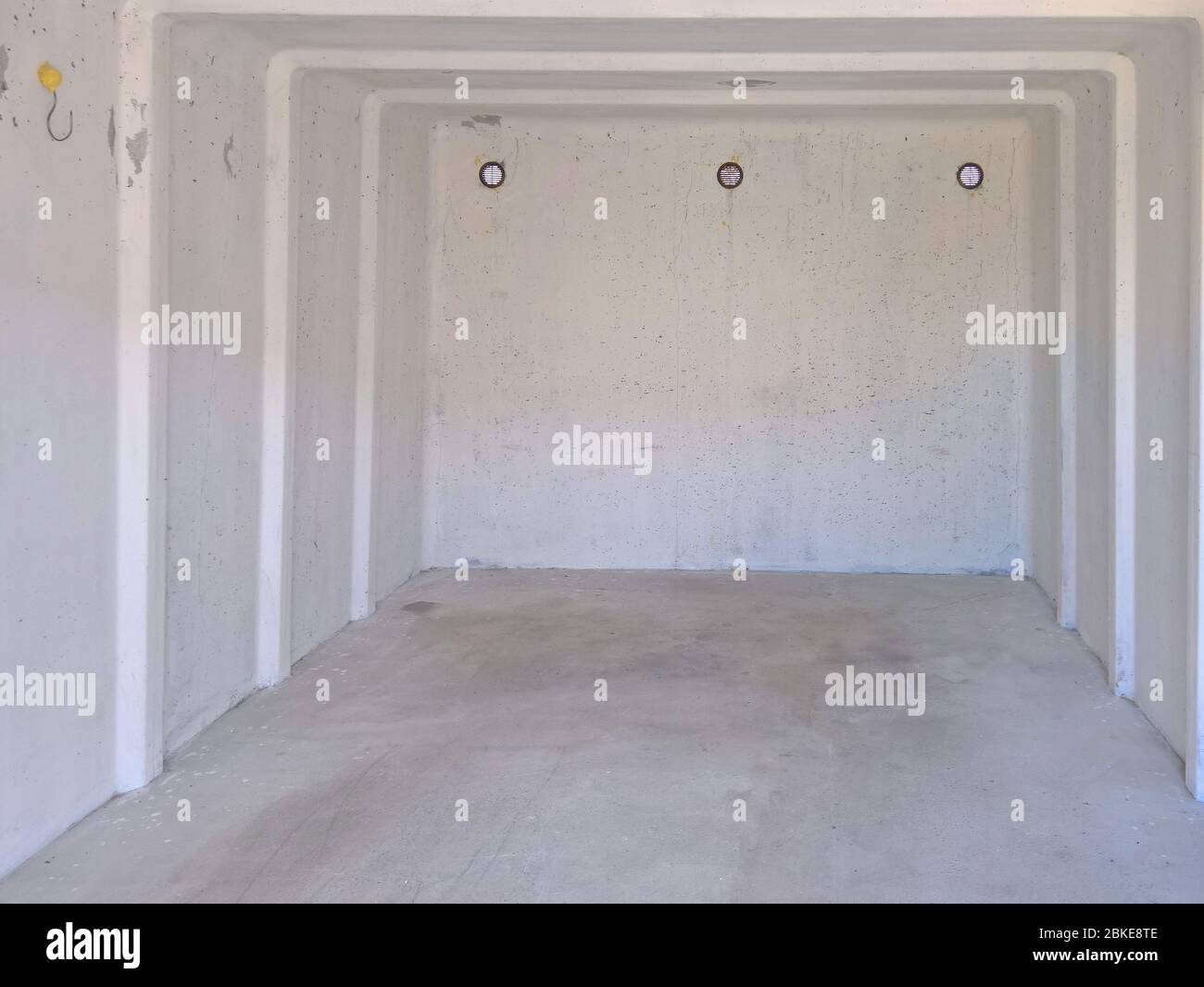 Empty garage from inside with open door Stock Photo - Alamy