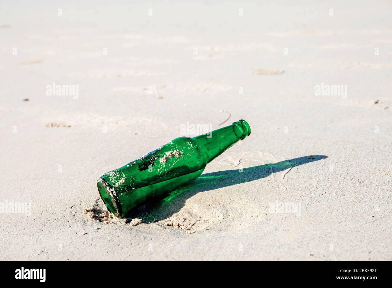 Empty bottle alcohol on beach hi-res stock photography and images - Alamy