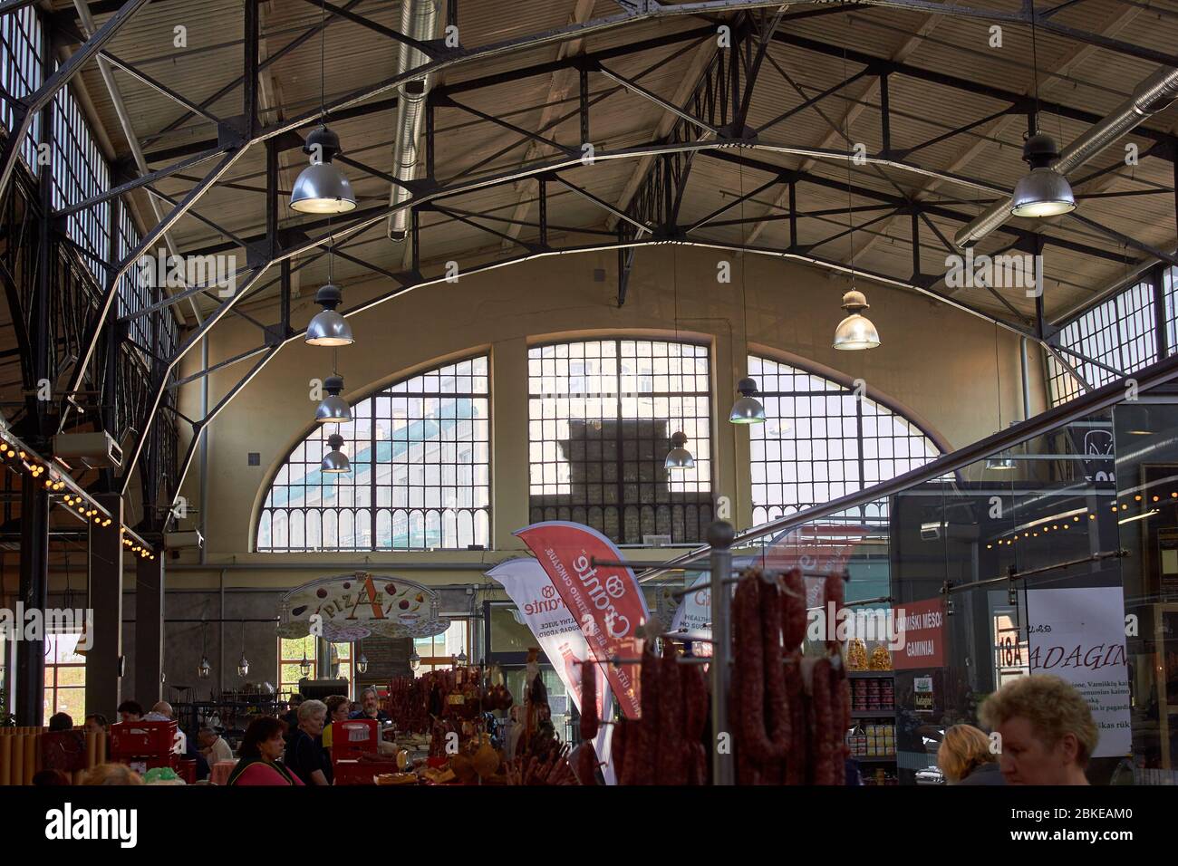 People in huge market hall Stock Photo - Alamy