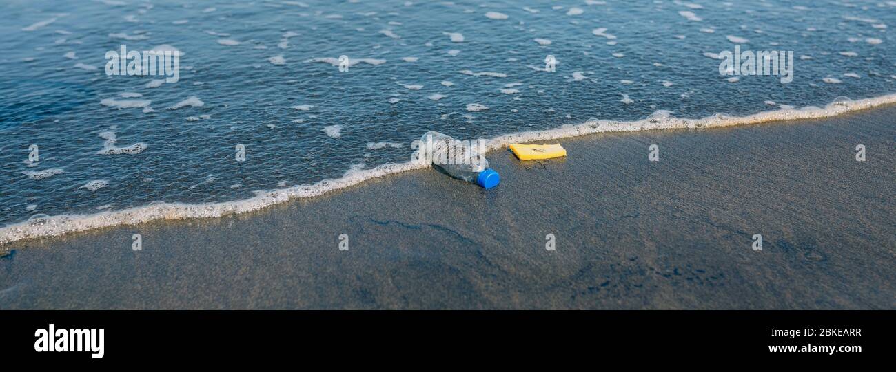 Garbage on the seashore Stock Photo - Alamy