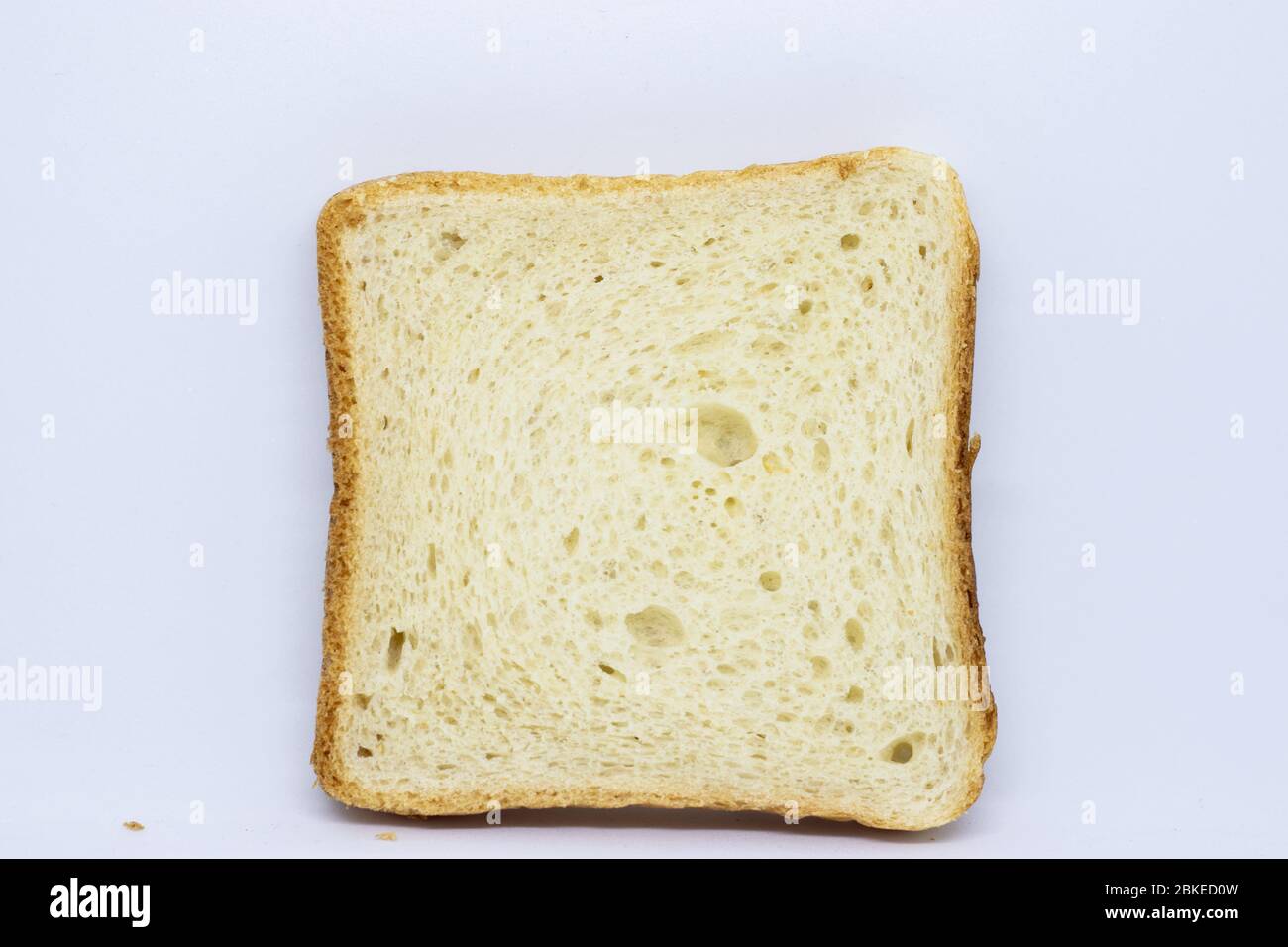 One slice of bread isolated on white background Stock Photo - Alamy
