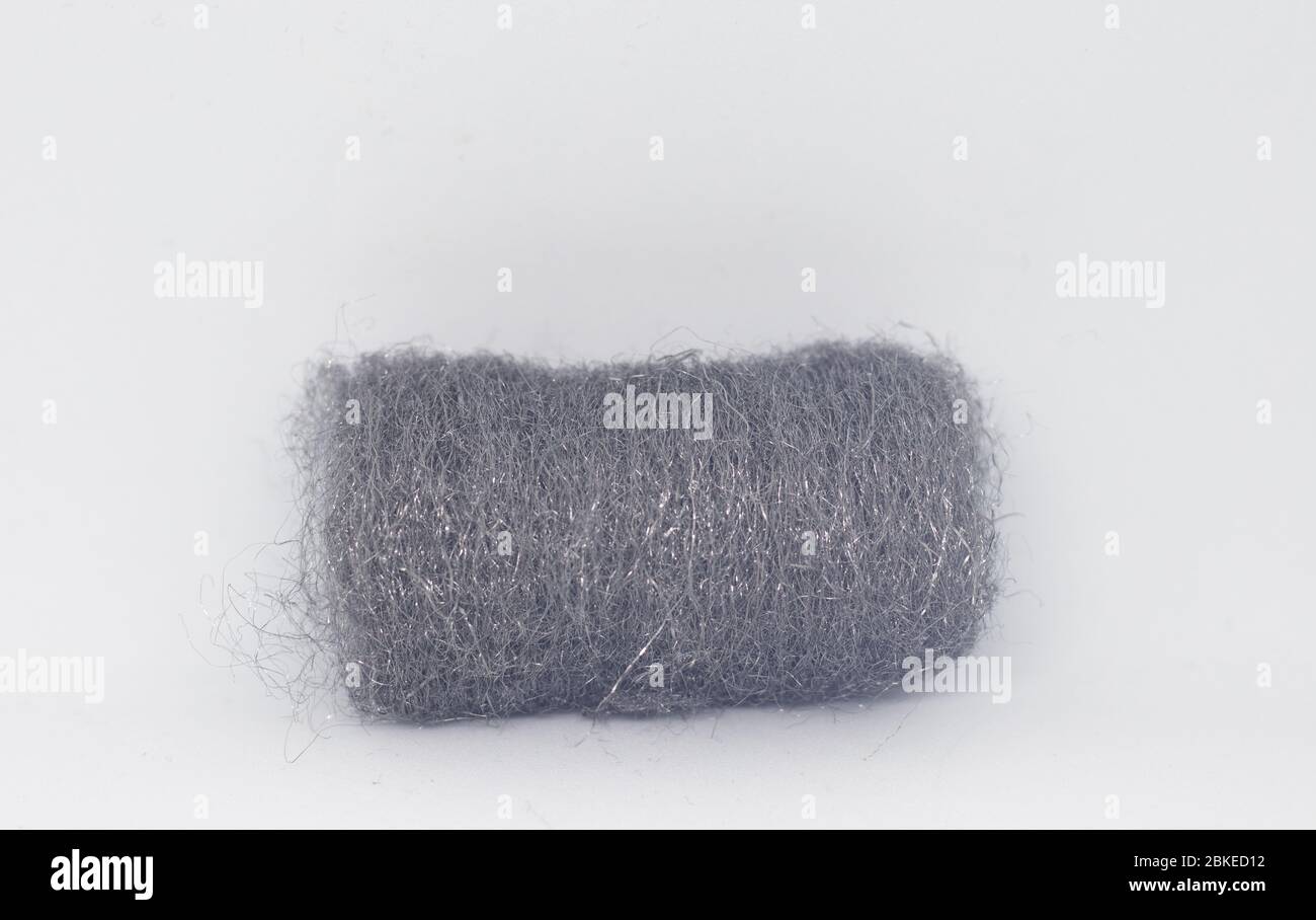 One piece of fine steel wool isolated on white background Stock Photo ...