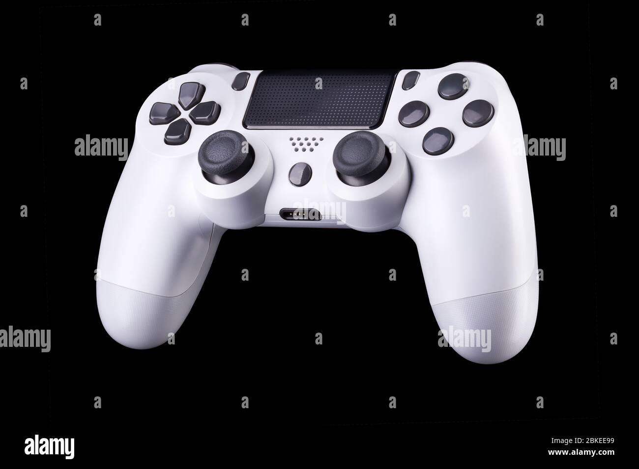 White video game joystick gamepad isolated on a black background Stock ...