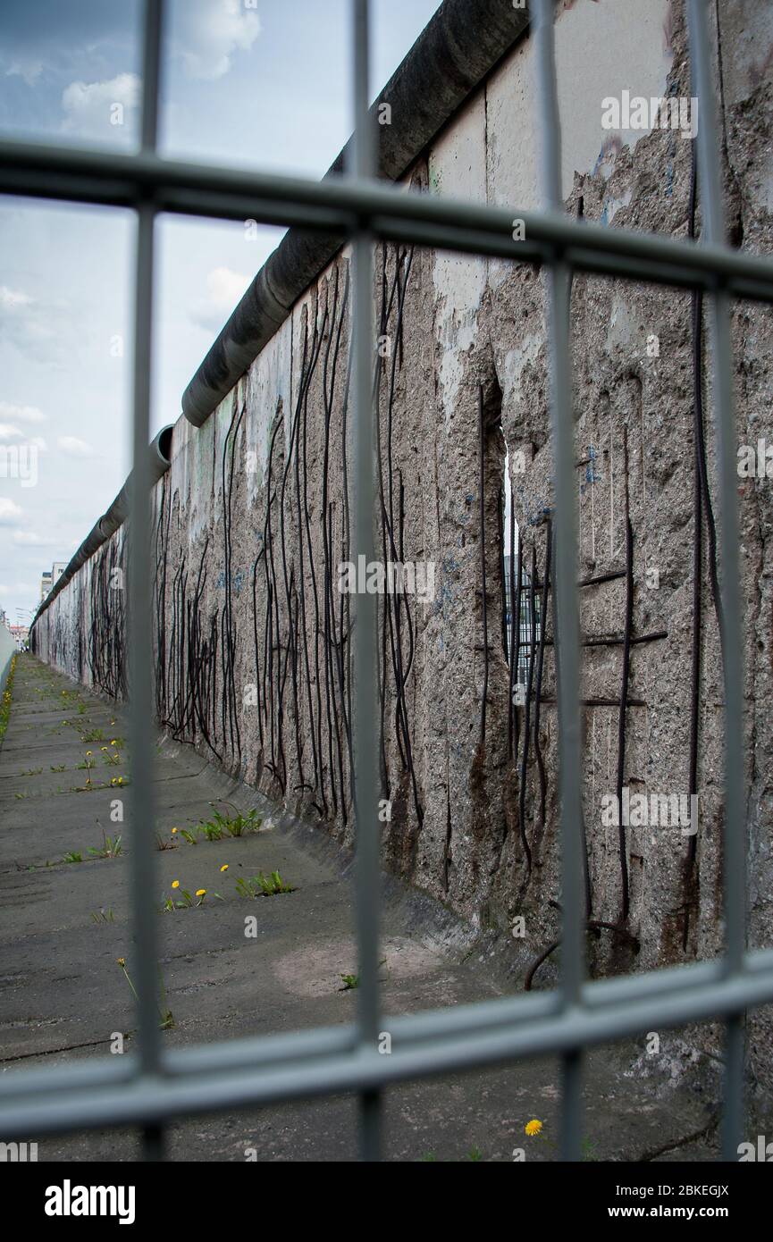 View to what remains of the Berlin Wall showing metal reinforcing, and ...