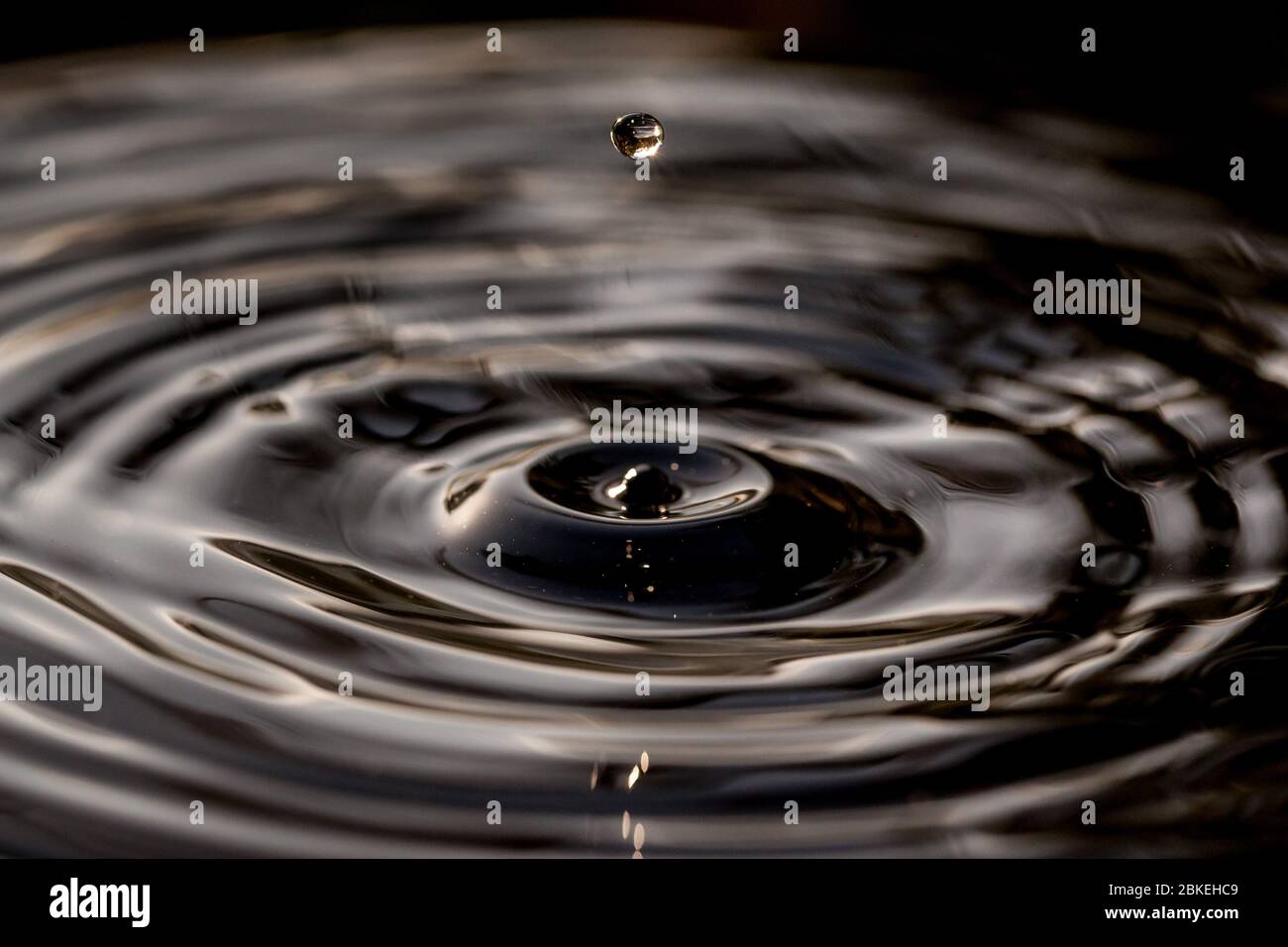 Water Drop splash with sun Stock Photo - Alamy