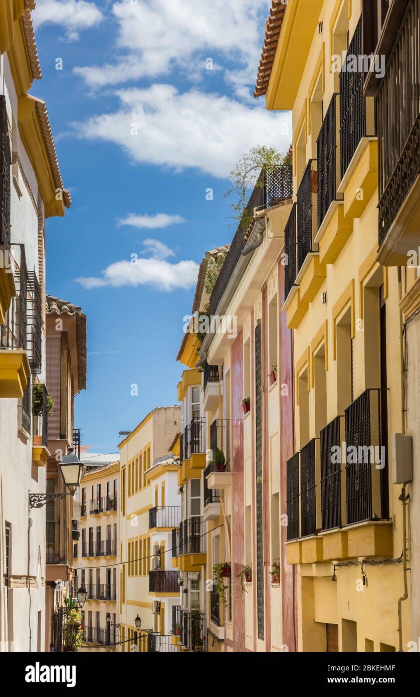 Colorful houses in a narrow street in Lorca, Spain Stock Photo - Alamy