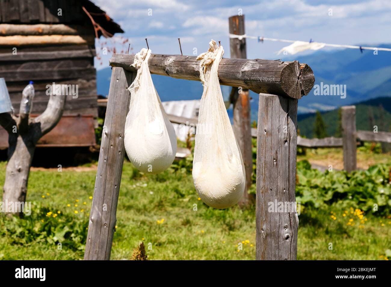 bags of ripening cheese on a mountain farm Stock Photo - Alamy