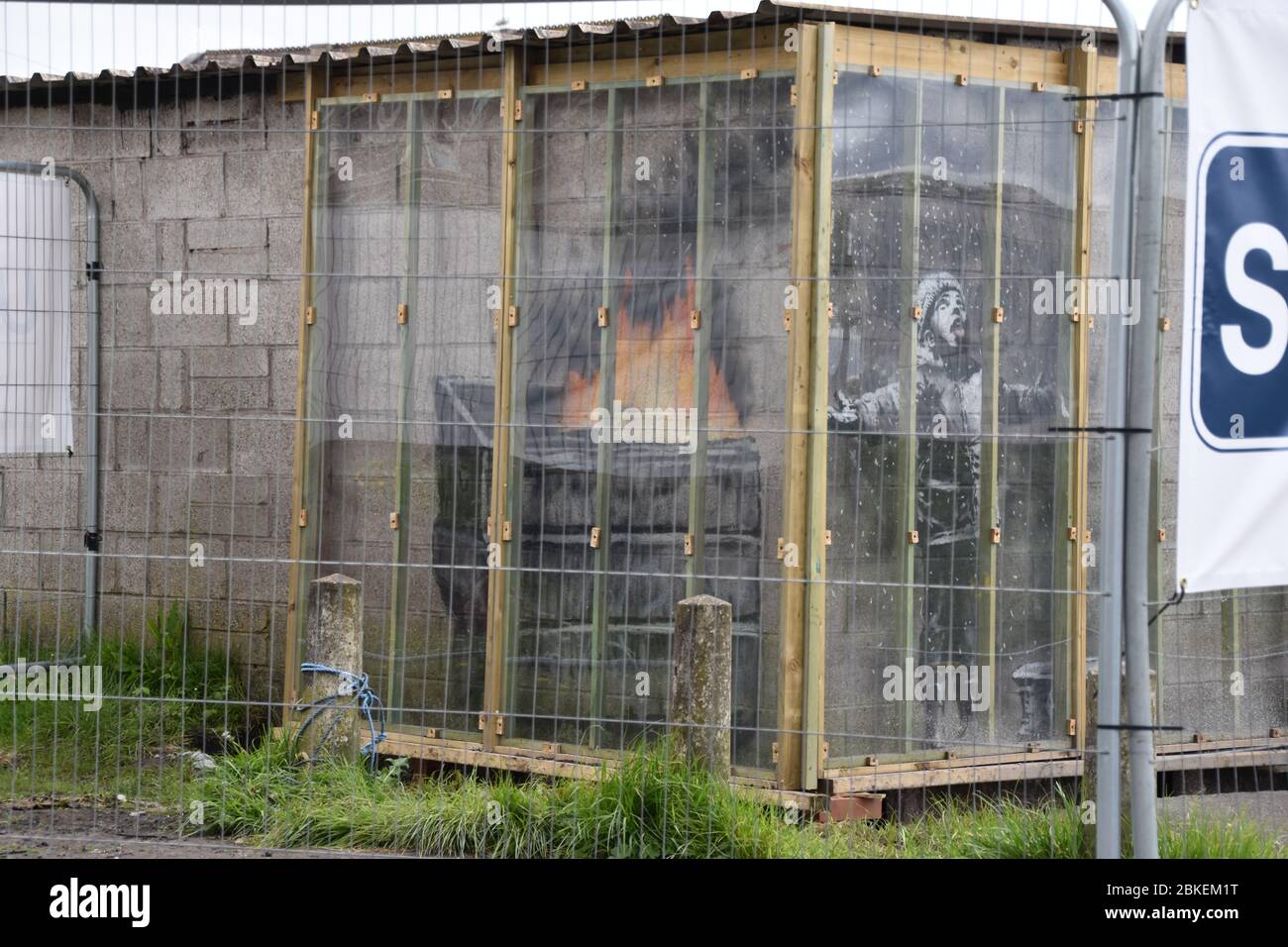 An art piece on a garage by the street artist Banksy in Port Talbot ...