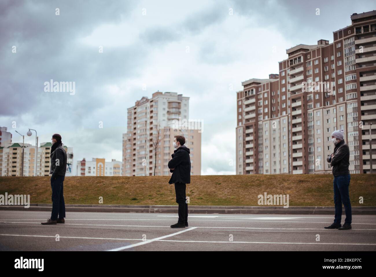 group of people standing in line at a safe distance Stock Photo - Alamy