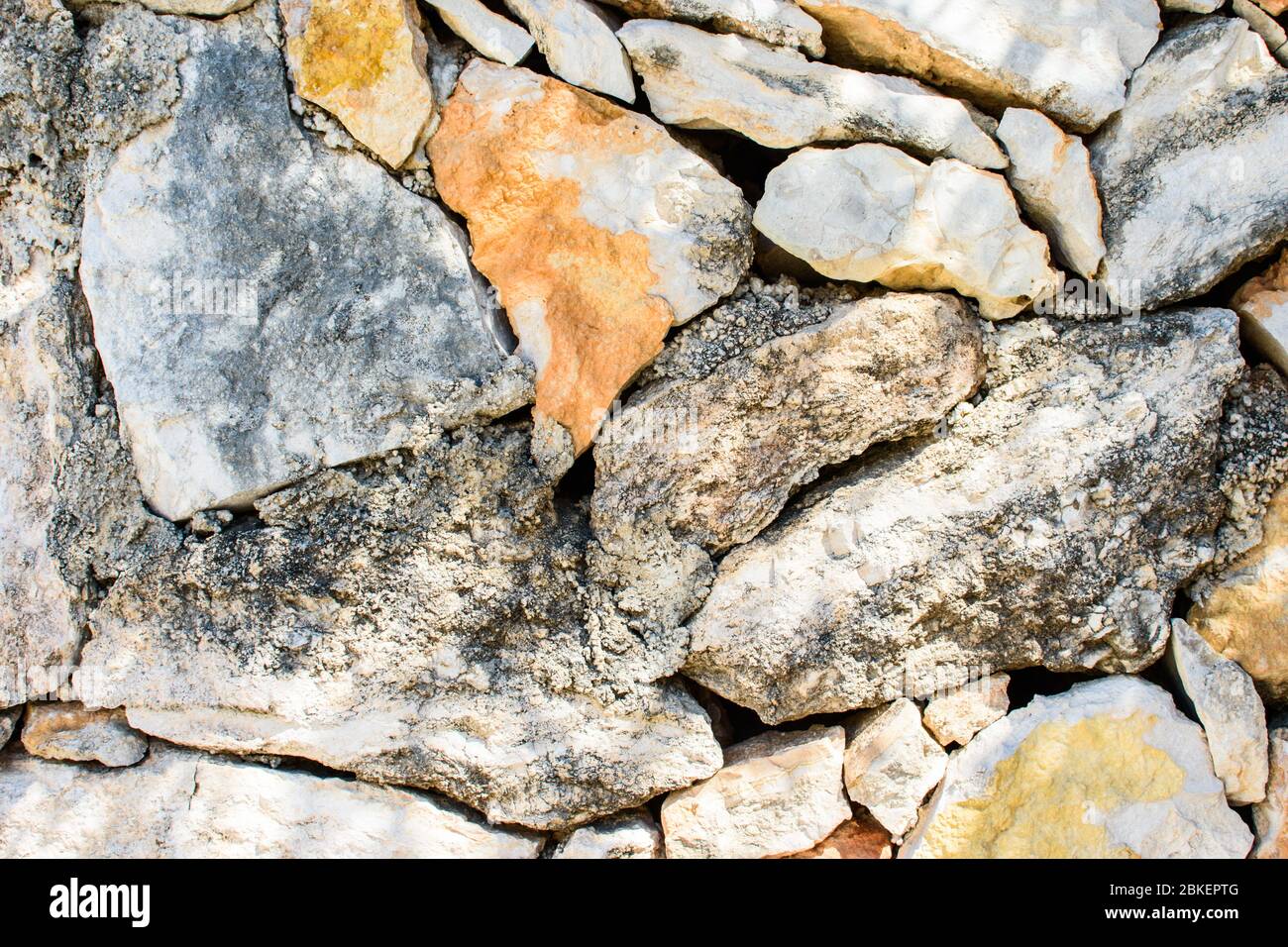Wall of large natural stones, natural background. Great for design and ...