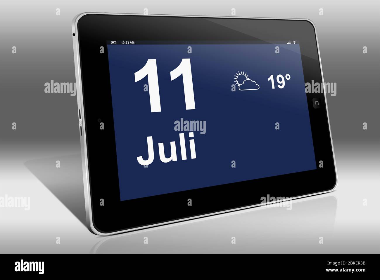 A tablet computer displays a calendar in German language with the date ...