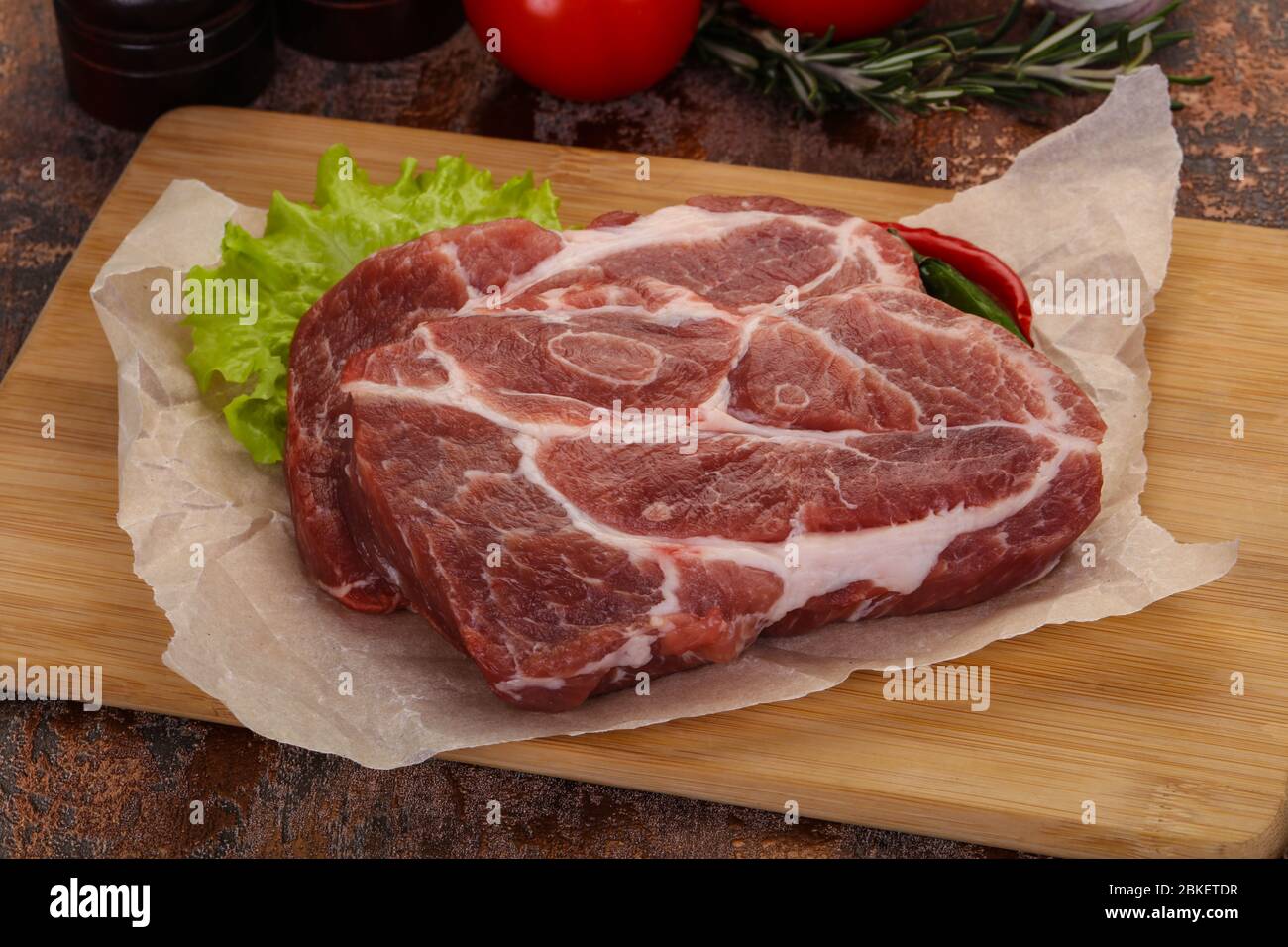 Raw pork neck steak ready for cooking Stock Photo - Alamy
