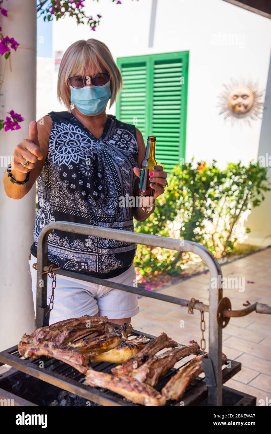 Mature woman cooking face on hi-res stock photography and images - Alamy
