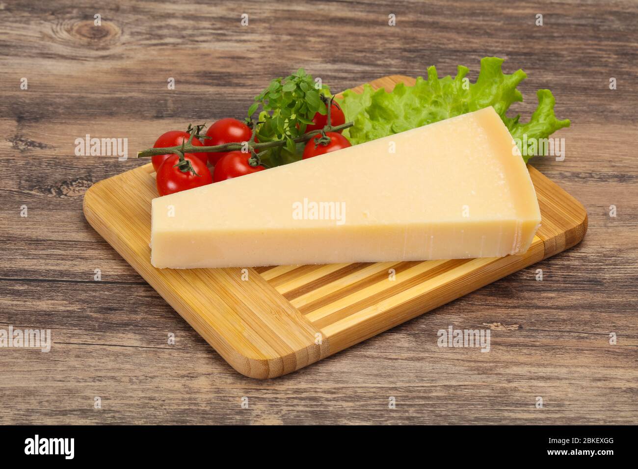 Italian traditional parmesan cheese triangle served salad Stock Photo ...