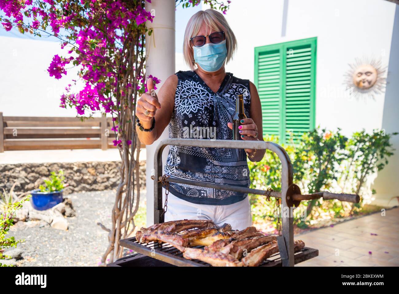 Mature woman cooking face on hi-res stock photography and images - Alamy