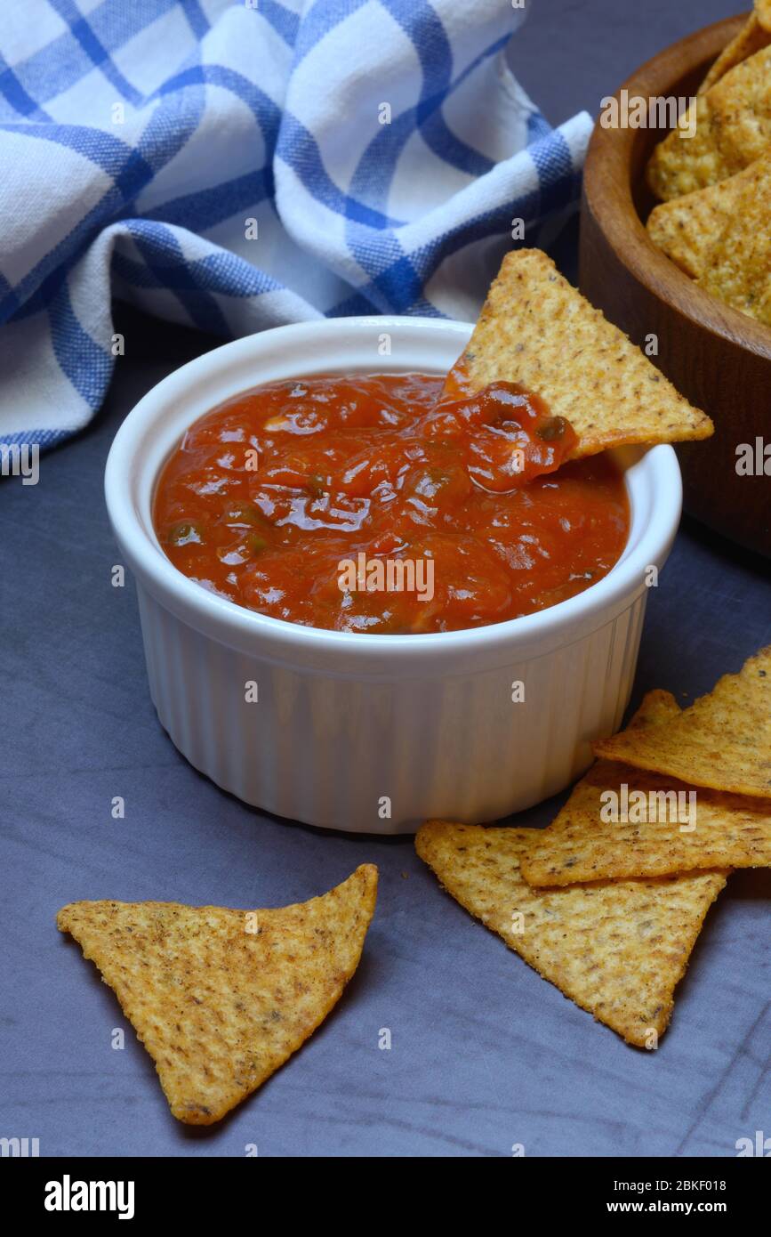 Salsa sauce in shell and tortilla chips, food photography, studio shot ...
