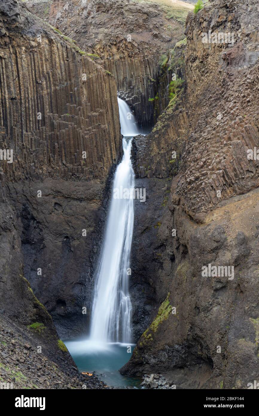Long exposure of the stunning Litlanesfoss waterfall where the water ...