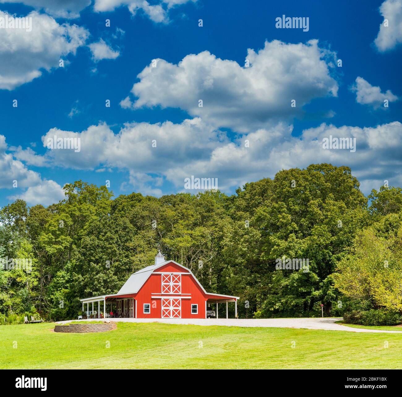Red Barn and Green Trees in Summer Stock Photo - Alamy