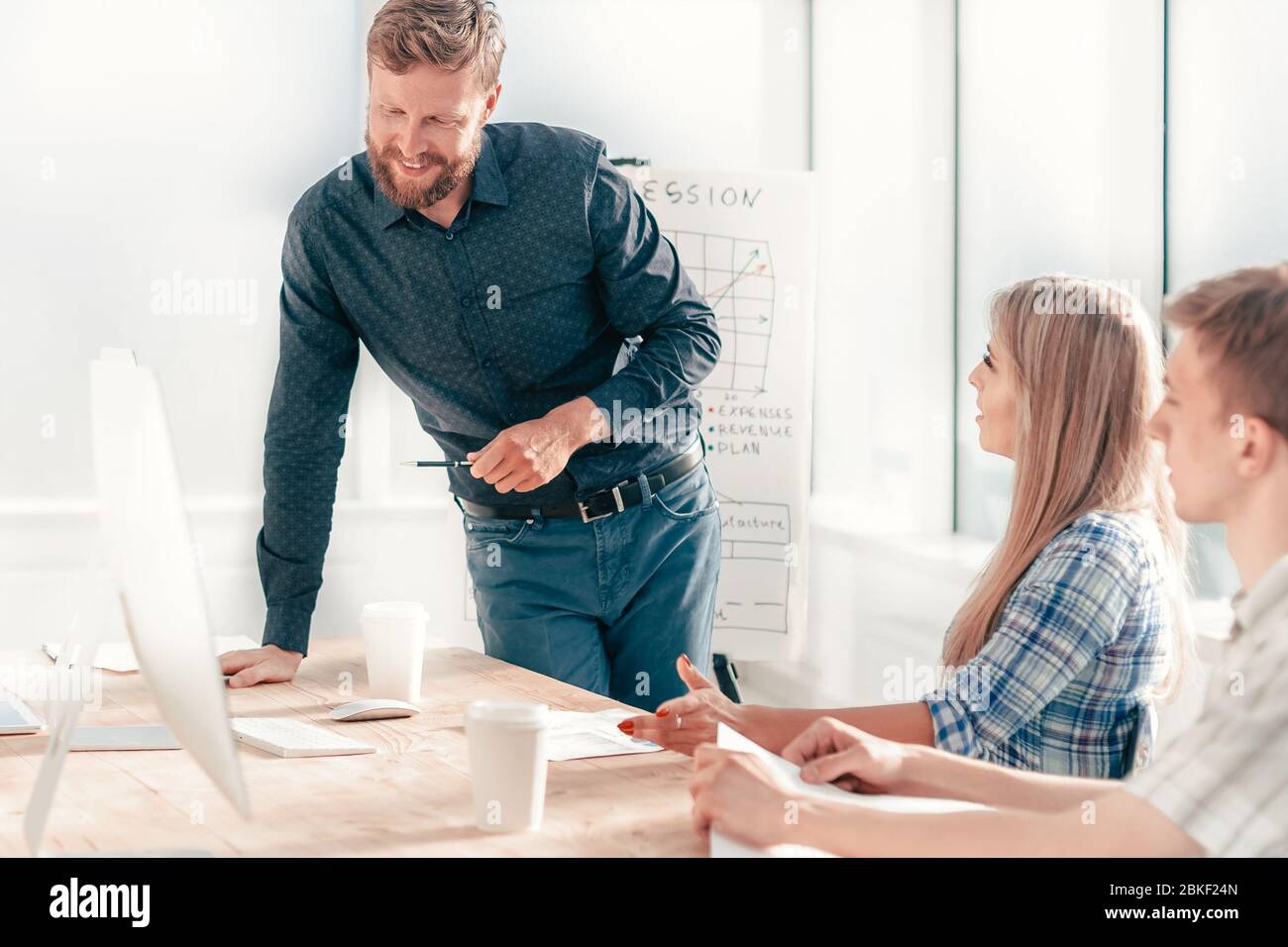 project Manager at a working meeting with the business team Stock Photo ...