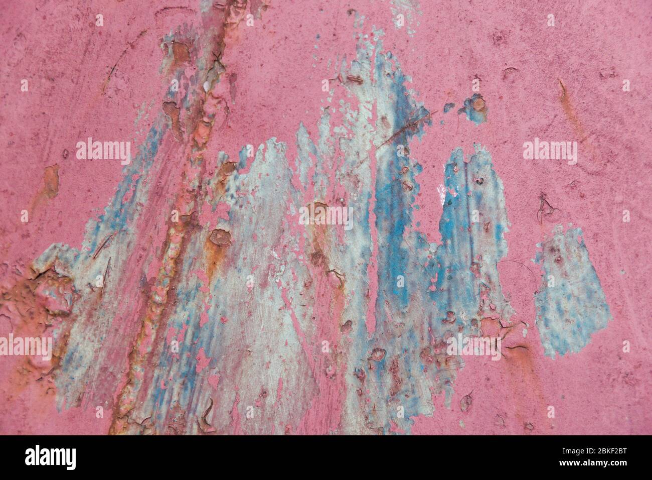 Rusty pink metal wall background with streaks of rust, texture ...