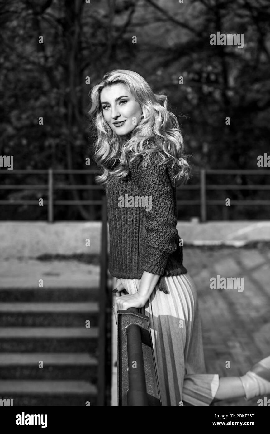 Woman in knitted sweater Black and White Stock Photos & Images - Alamy