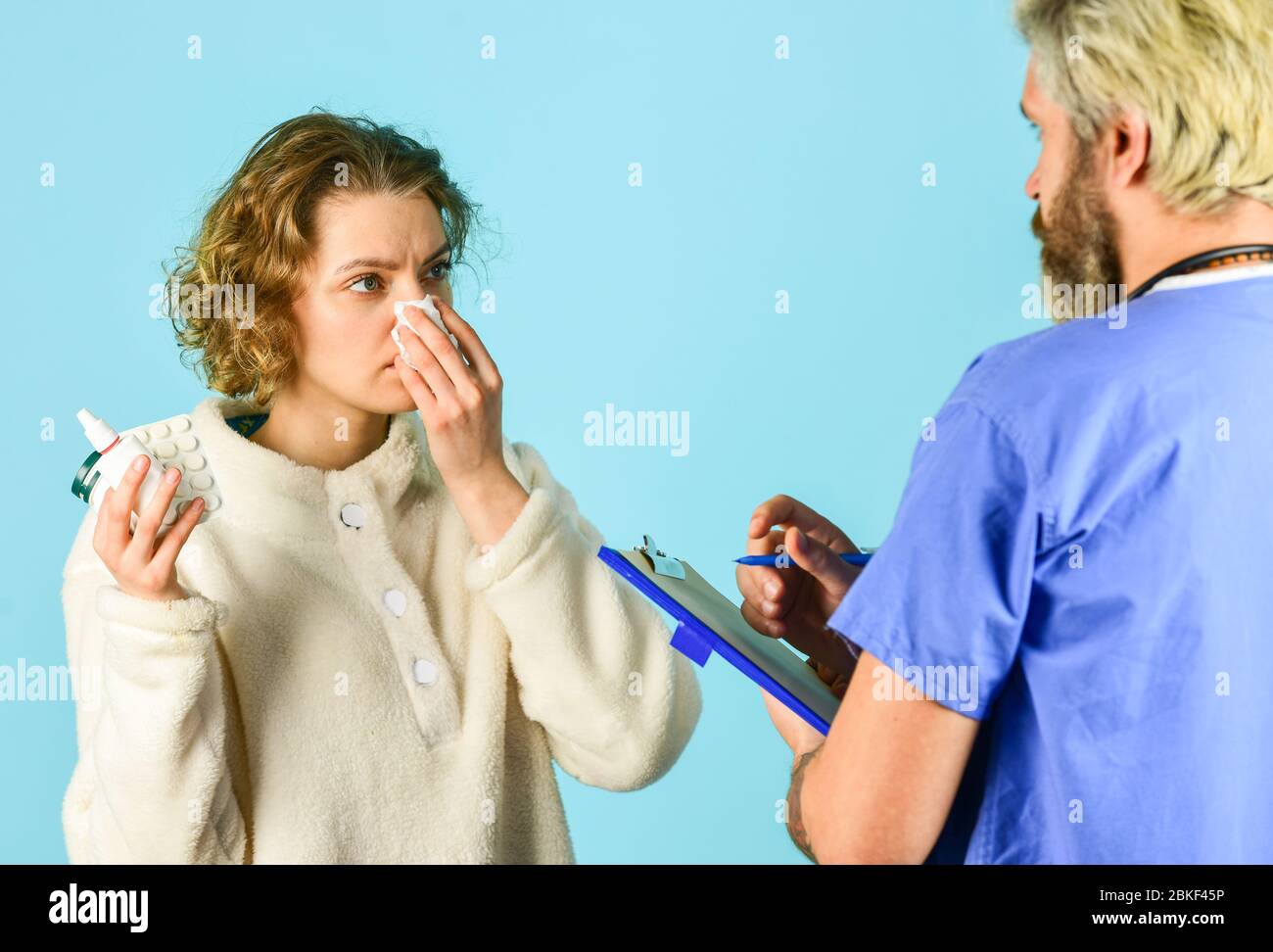 Medical history. Doctor communicate woman. Runny nose. Ask for ...