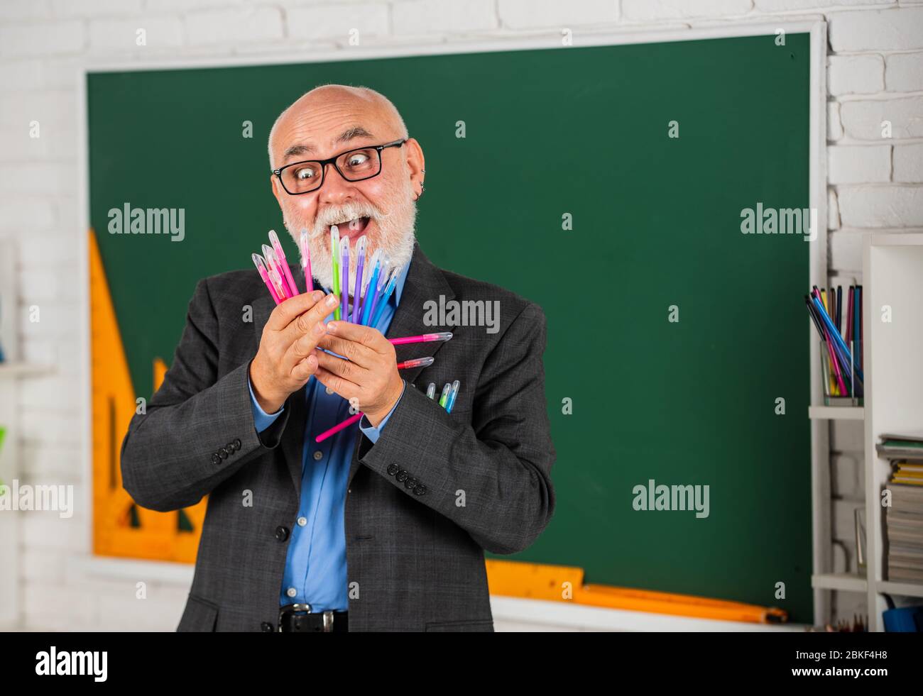 back to school. classroom with blackboard. school writing items ...