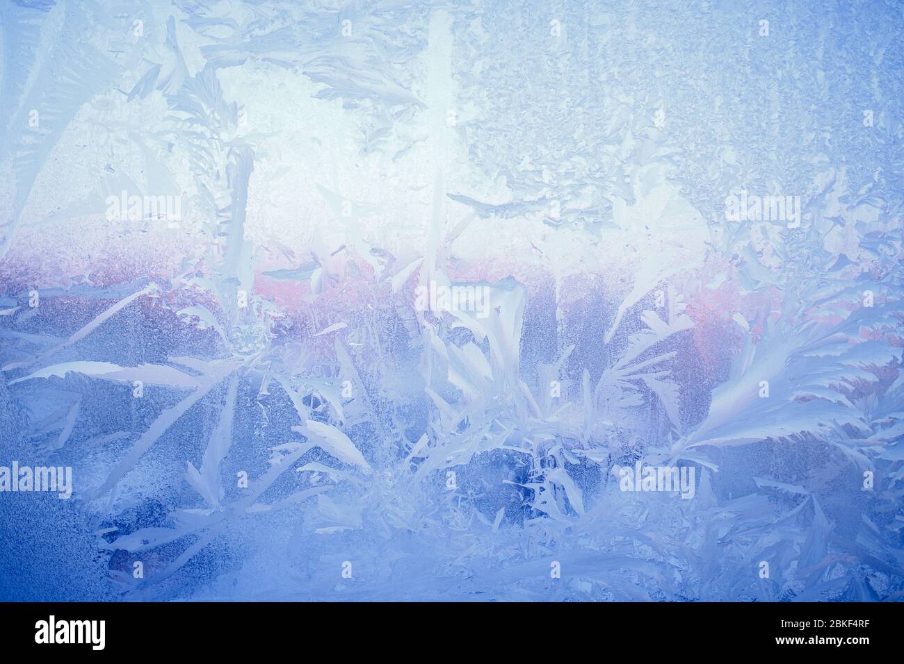 Frost drawing on window glass, snowflake ornament after anomaly ice ...