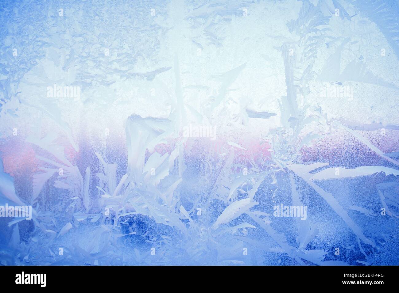 Frost drawing on window glass, snowflake ornament after anomaly ice ...
