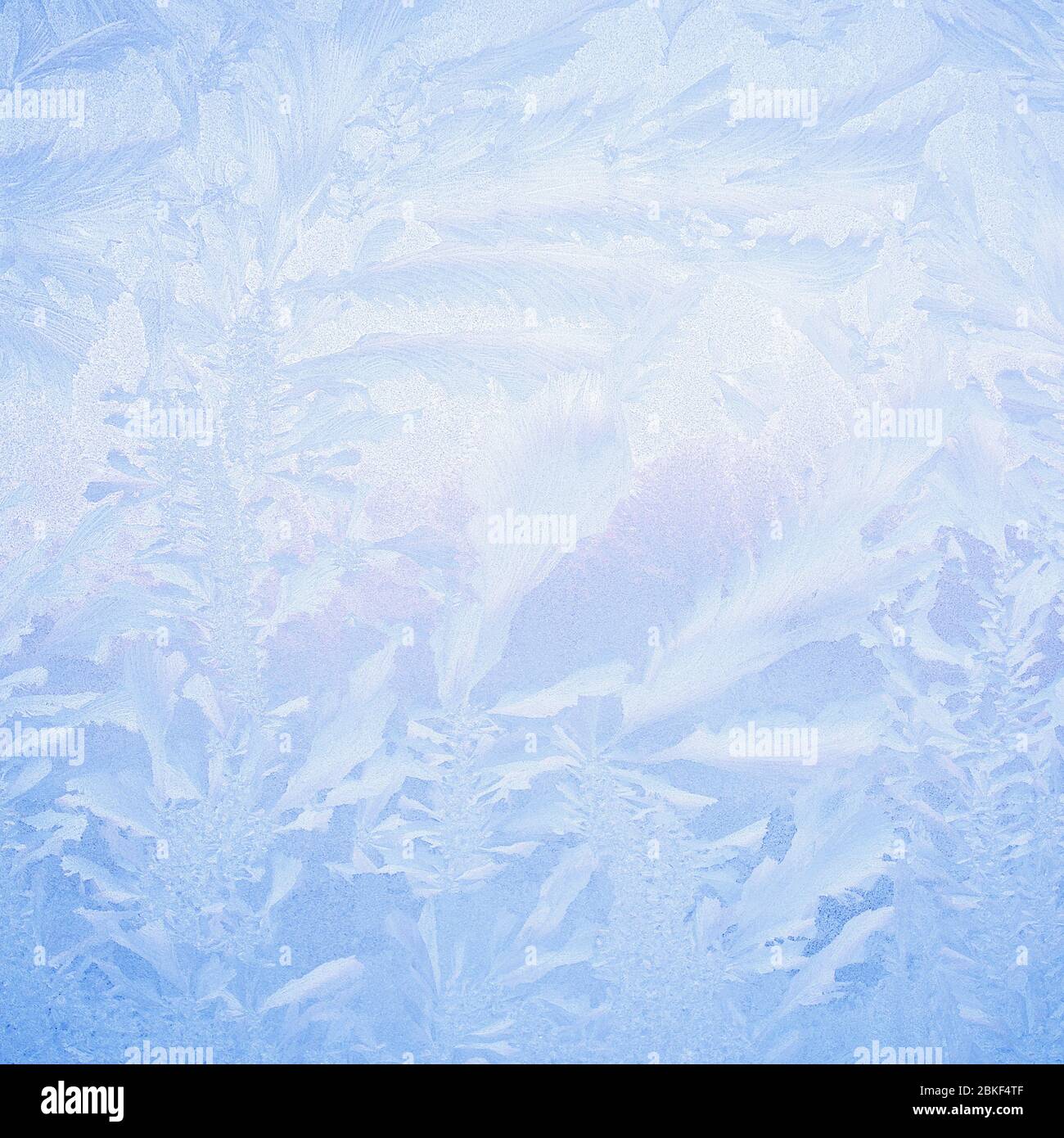 Frost drawing on window glass, snowflake ornament after anomaly ice ...