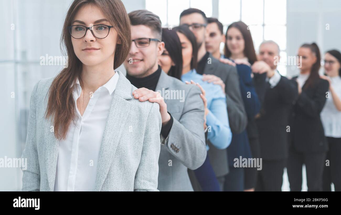 group of young business people standing behind each other Stock Photo ...