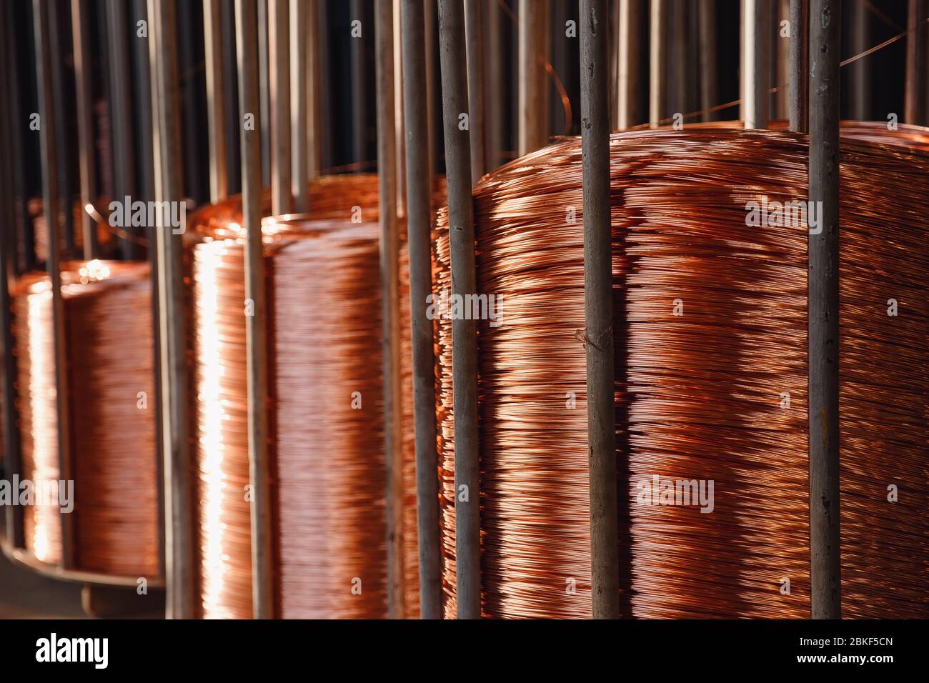 Production of copper wire, bronze cable in reels at factory Stock Photo ...