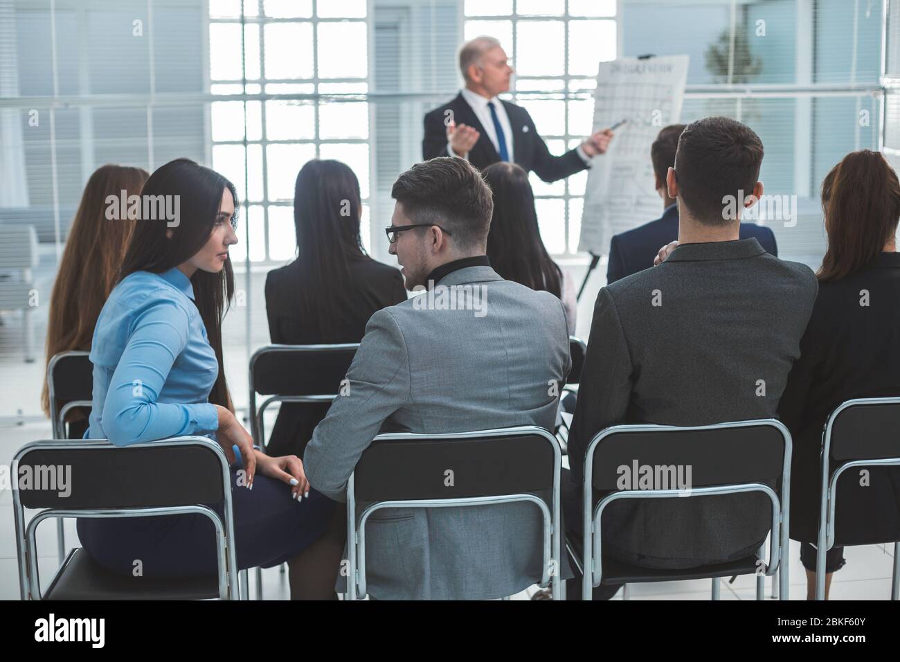 Rear view diverse team listening hi-res stock photography and images ...