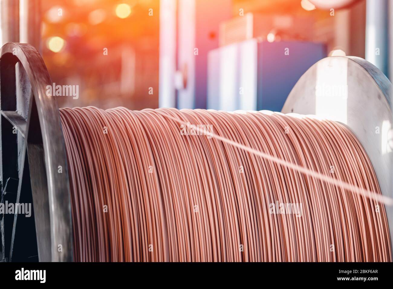Production of copper wire, bronze cable in reels at factory Stock Photo ...
