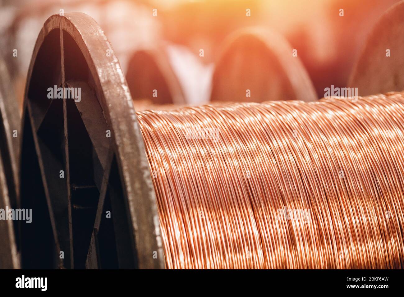 Production of copper wire, bronze cable in reels at factory Stock Photo ...