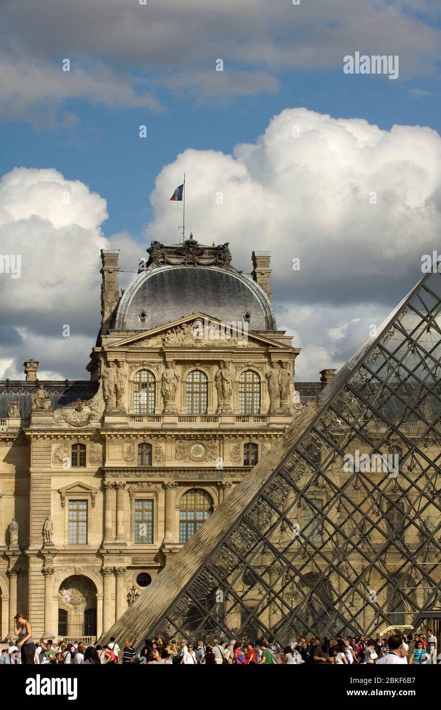 The Sully Wing, Pyramid entrance and people at the The Louvre, Paris ...