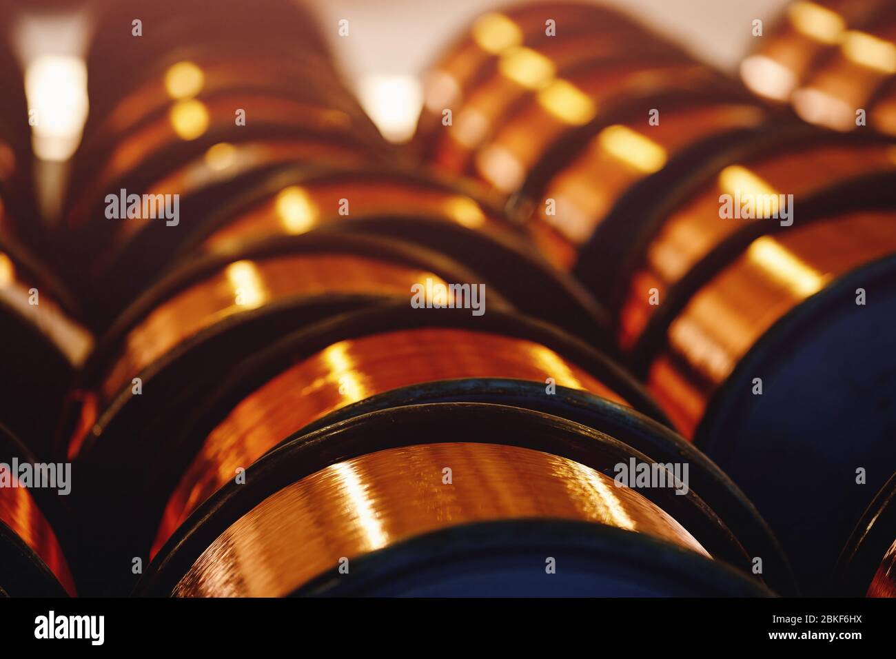 Production of copper wire, bronze cable in reels at factory Stock Photo ...