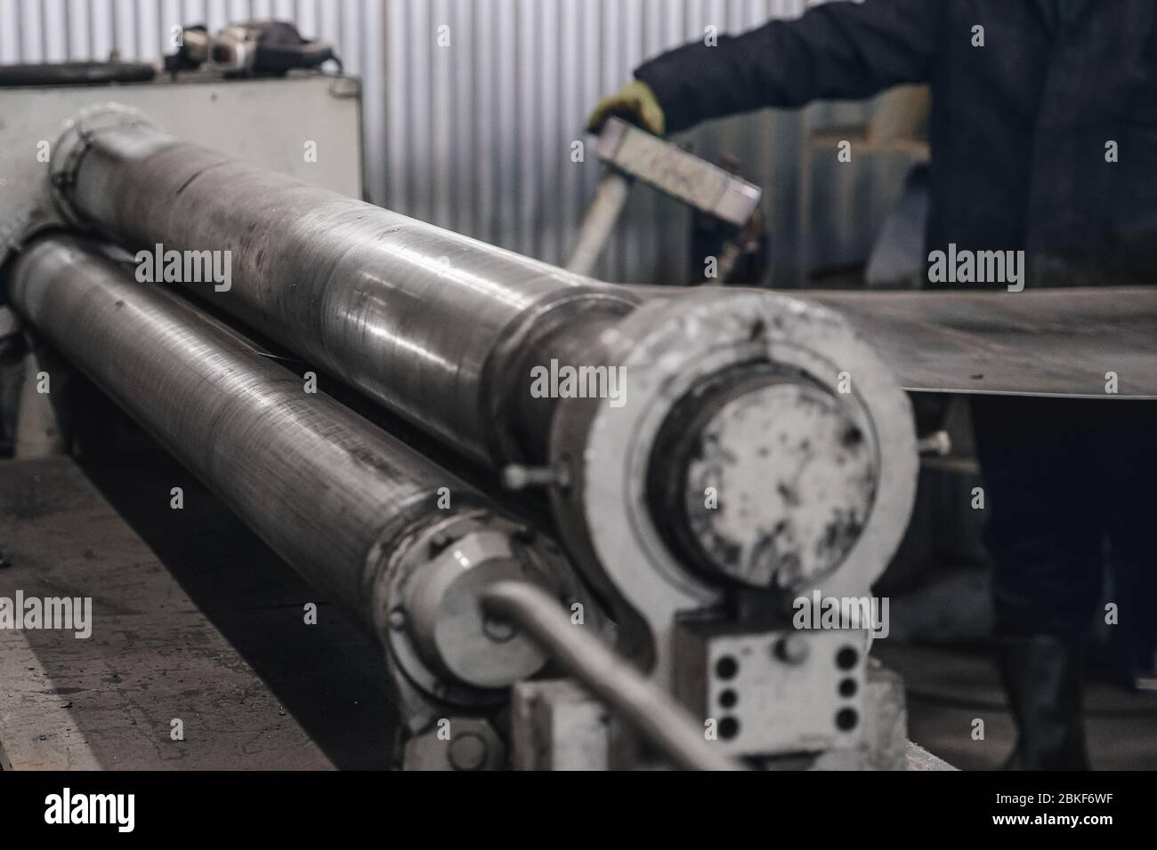 Sheet metal worker rollers hi-res stock photography and images - Alamy