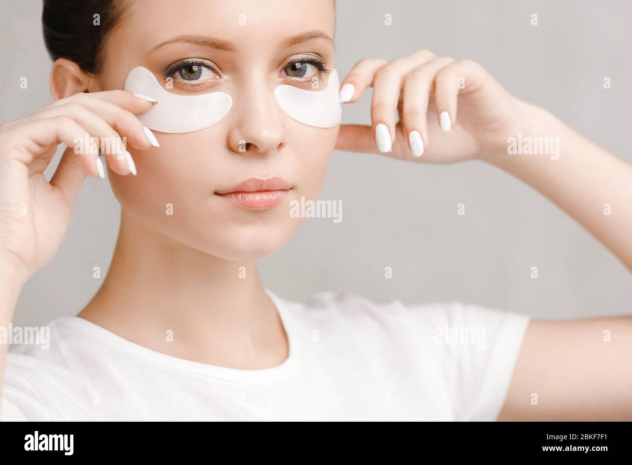 Beauty woman with patches. Mask under eyes treatment face Stock Photo ...